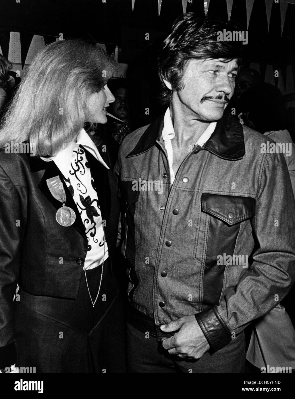 Jill Ireland, Charles Bronson at a gathering, 1977 Stock Photo - Alamy