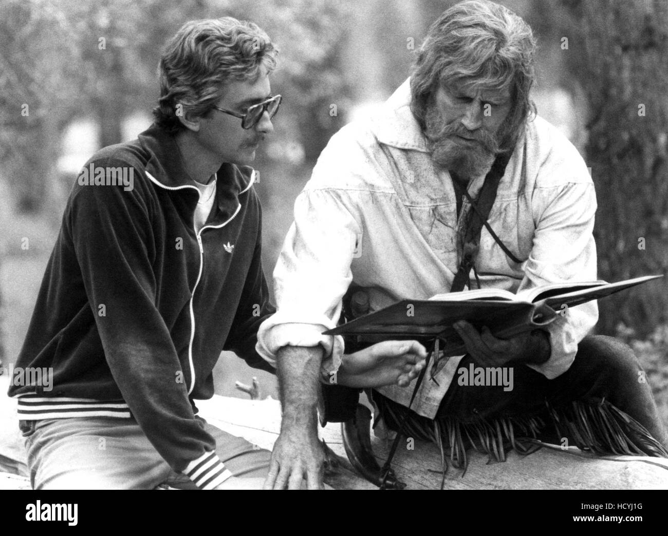 Writer-director FRASER HESTON goes over script with father CHARLTON ...