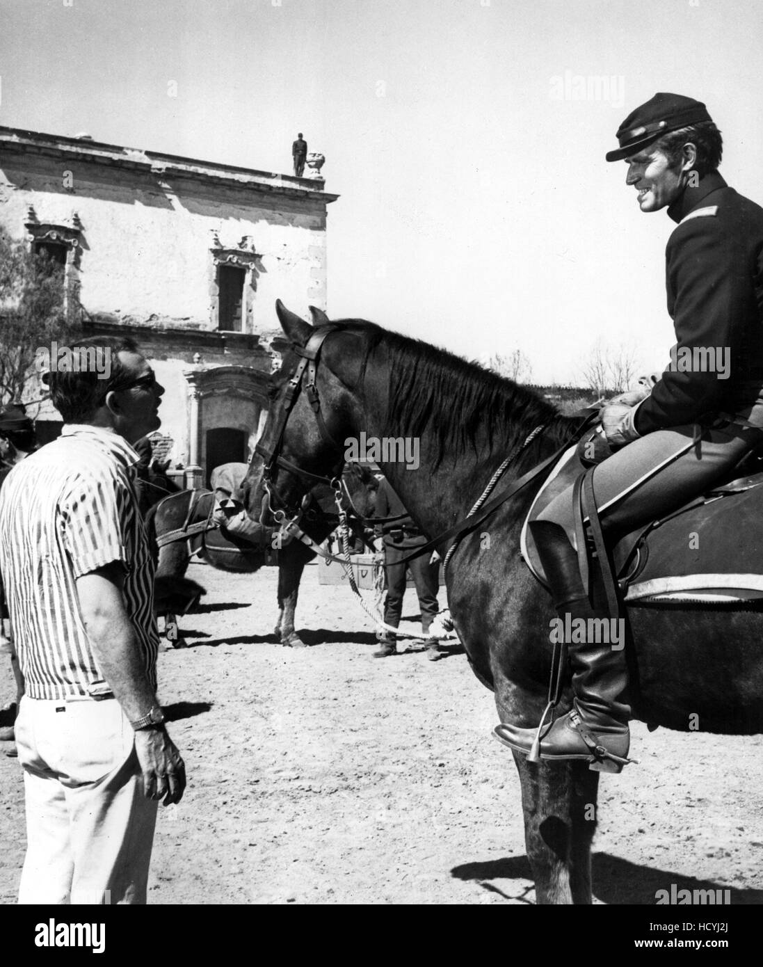 Director Sam Peckinpah, Charlton Heston on the set of MAJOR DUNDEE ...