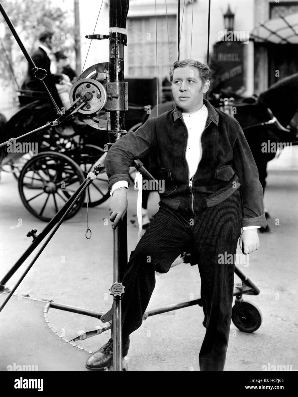 Charles Laughton relaxing between takes on the set of RUGGLES OF RED ...