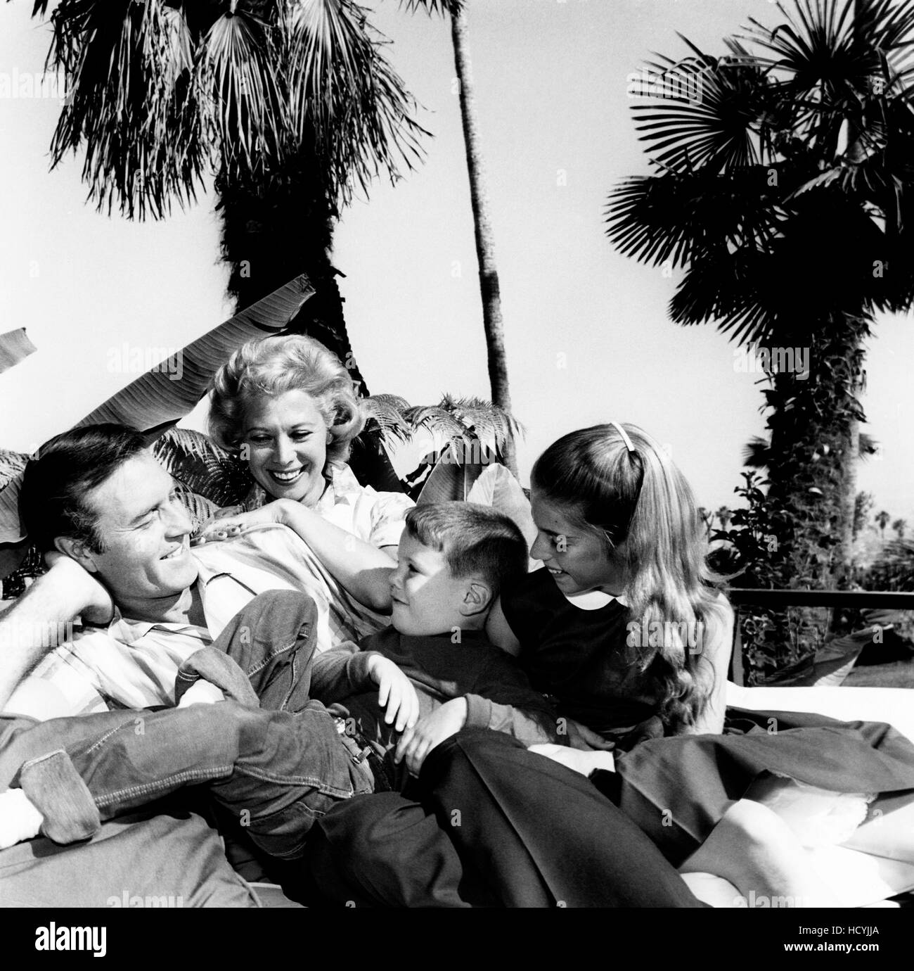 From left: George Montgomery, Dinah Shore at home with son John ...