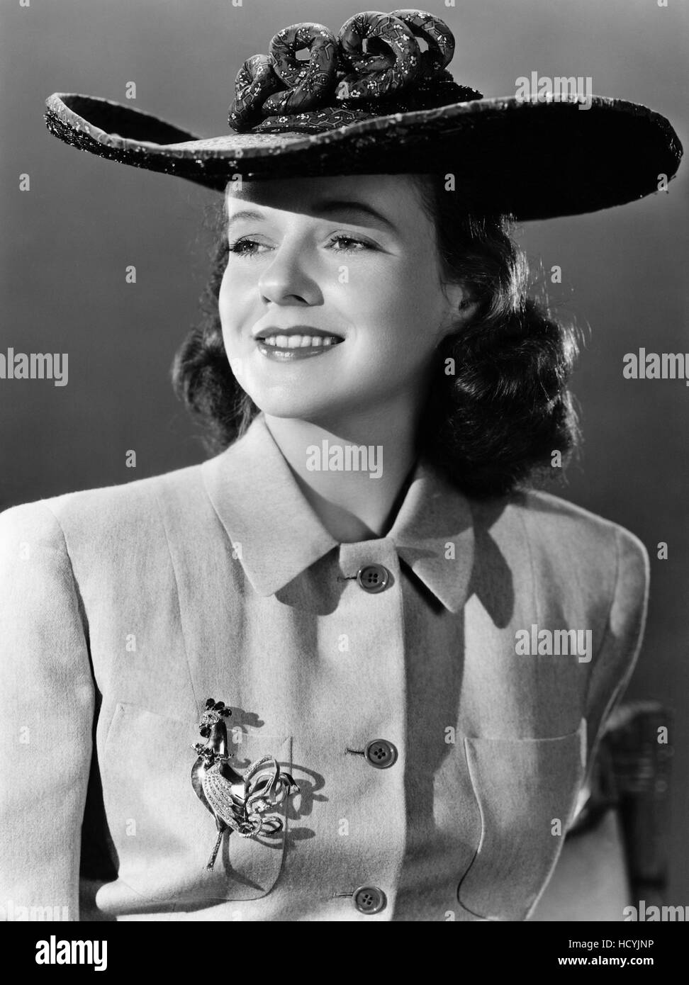 Dorothy Comingore, modeling an autumn hat of braided challis, 1941 ...