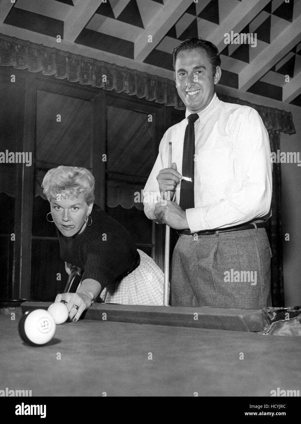 DORIS DAY and her husband MARTIN MELCHER enjoy a game of pool, 1954 ...