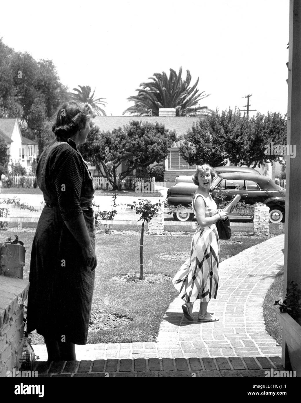 DORIS DAY says goodbye to her mother as she leaves for work, 1949 Stock ...