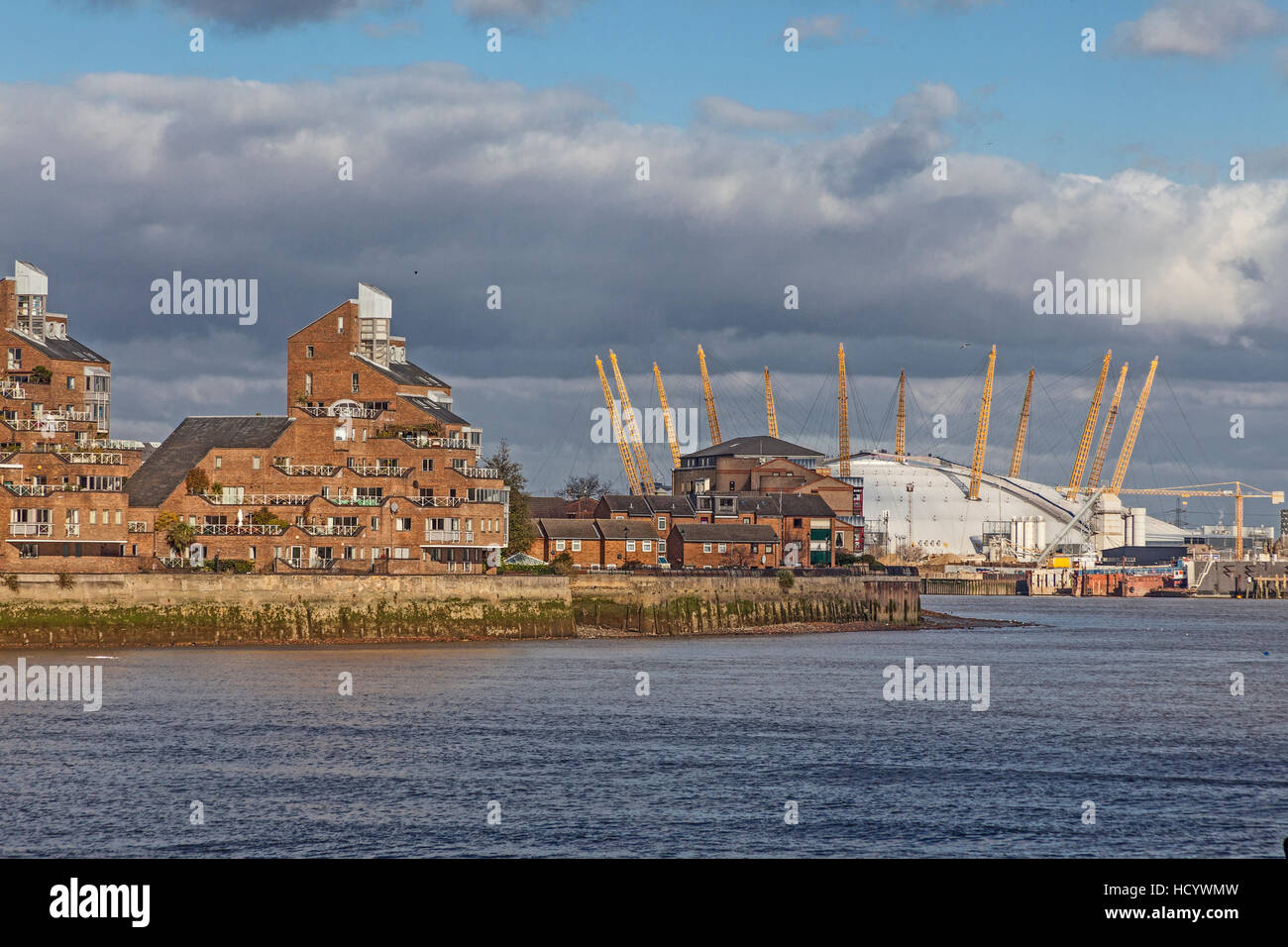 A view across river from Greenwich towards luxury apartment blocks and ...