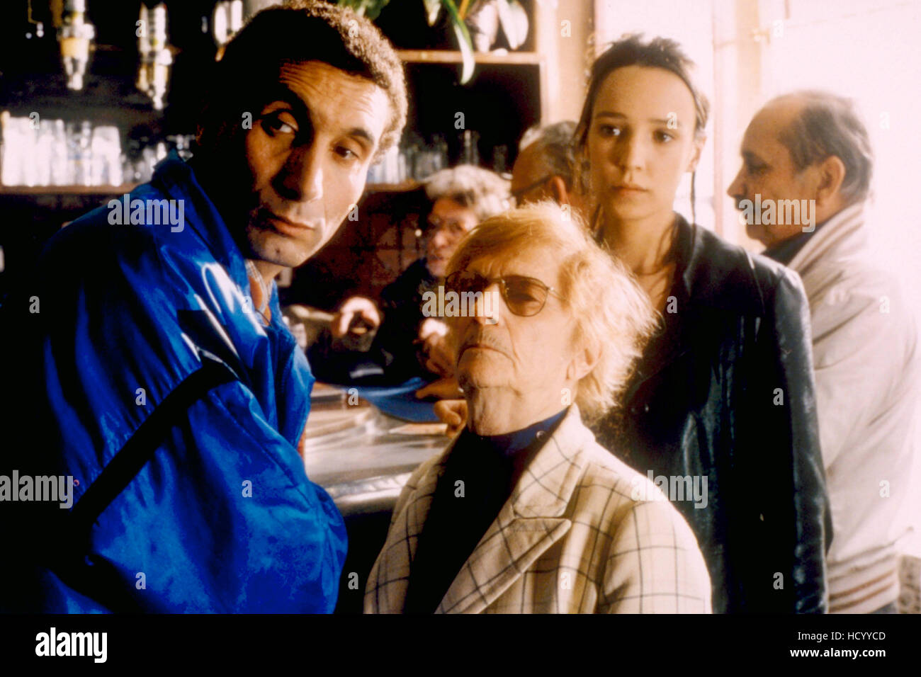 WHEN THE CAT'S AWAY, Zinedine Soualem (left), Renee Le Calm (background ...
