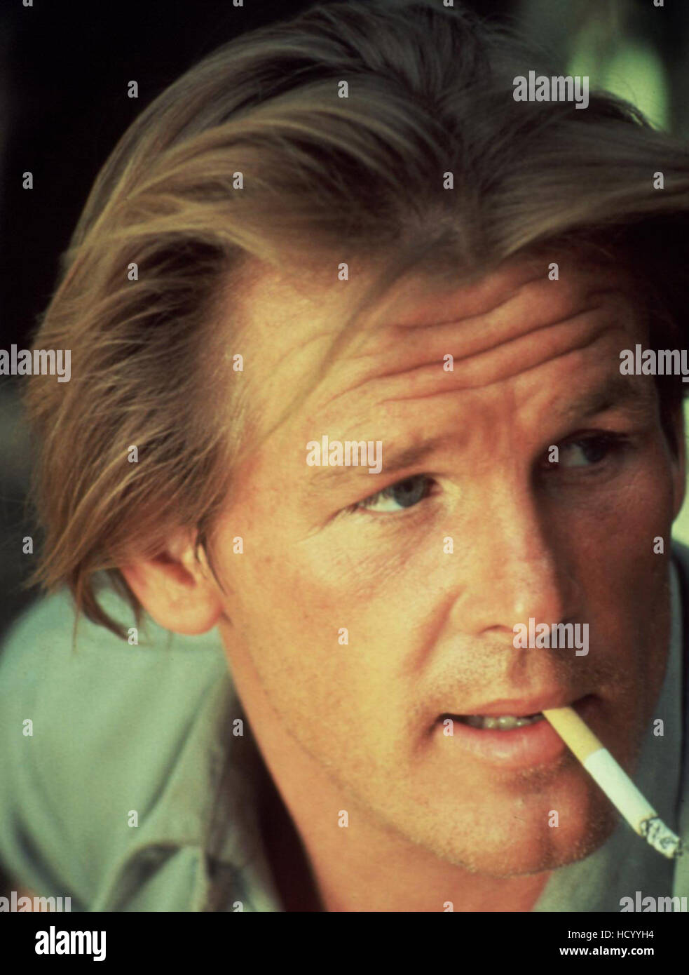 WHO'LL STOP THE RAIN, Nick Nolte, 1978, smoking Stock Photo - Alamy