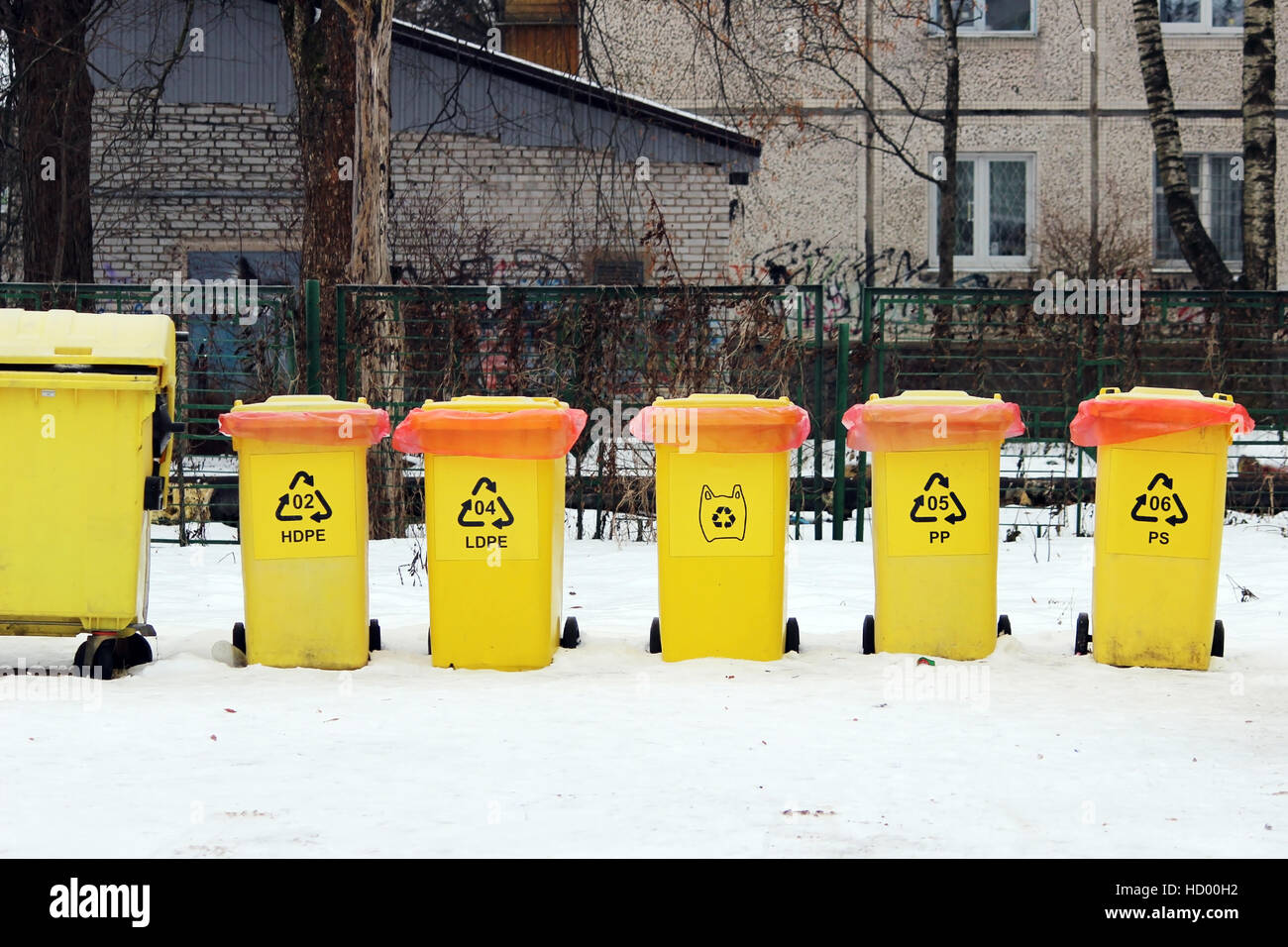 Several yellow Bins For Collection Of Recycle Materials Stock Photo - Alamy