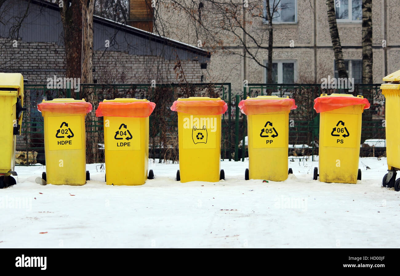Several yellow Bins For Collection Of Recycle Materials Stock Photo - Alamy