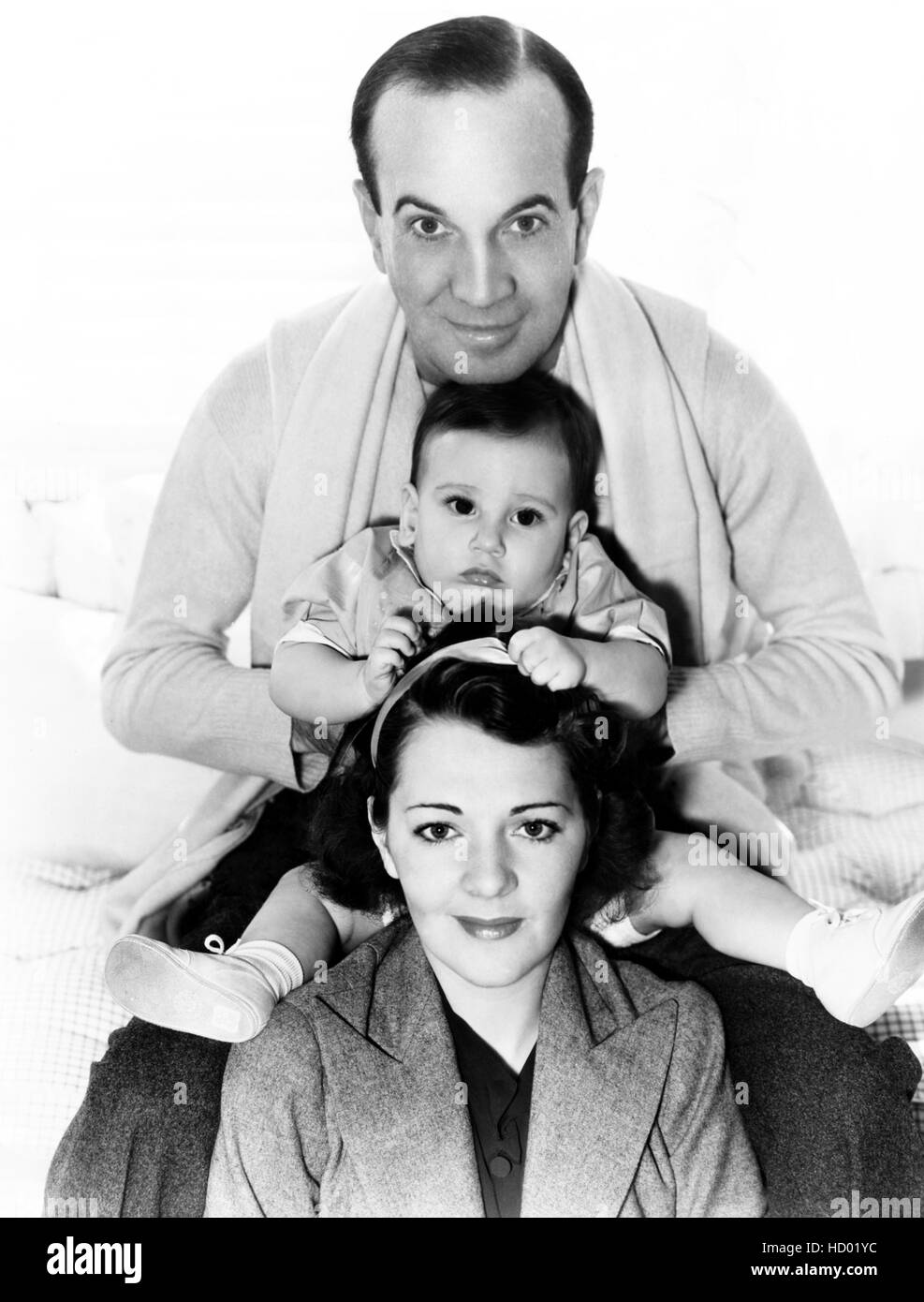 Al Jolson with third wife, Ruby Keeler, and adopted son, Al, Jr., ca ...