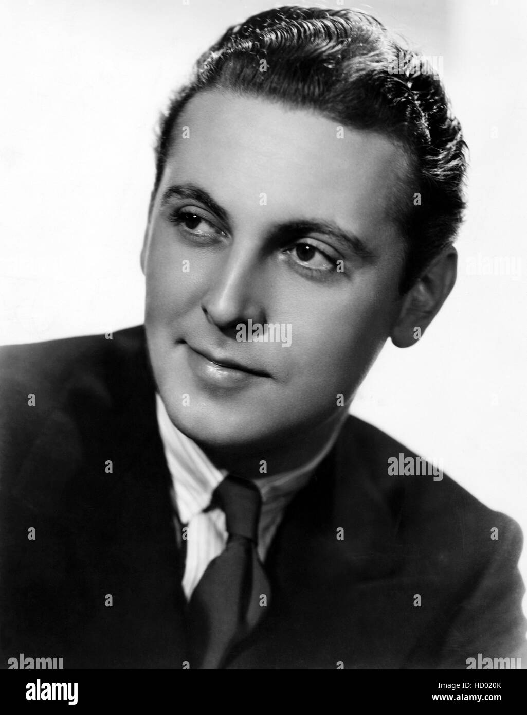 Allan Jones, MGM photo by Clarence Sinclair Bull, ca. 1937 Stock Photo ...