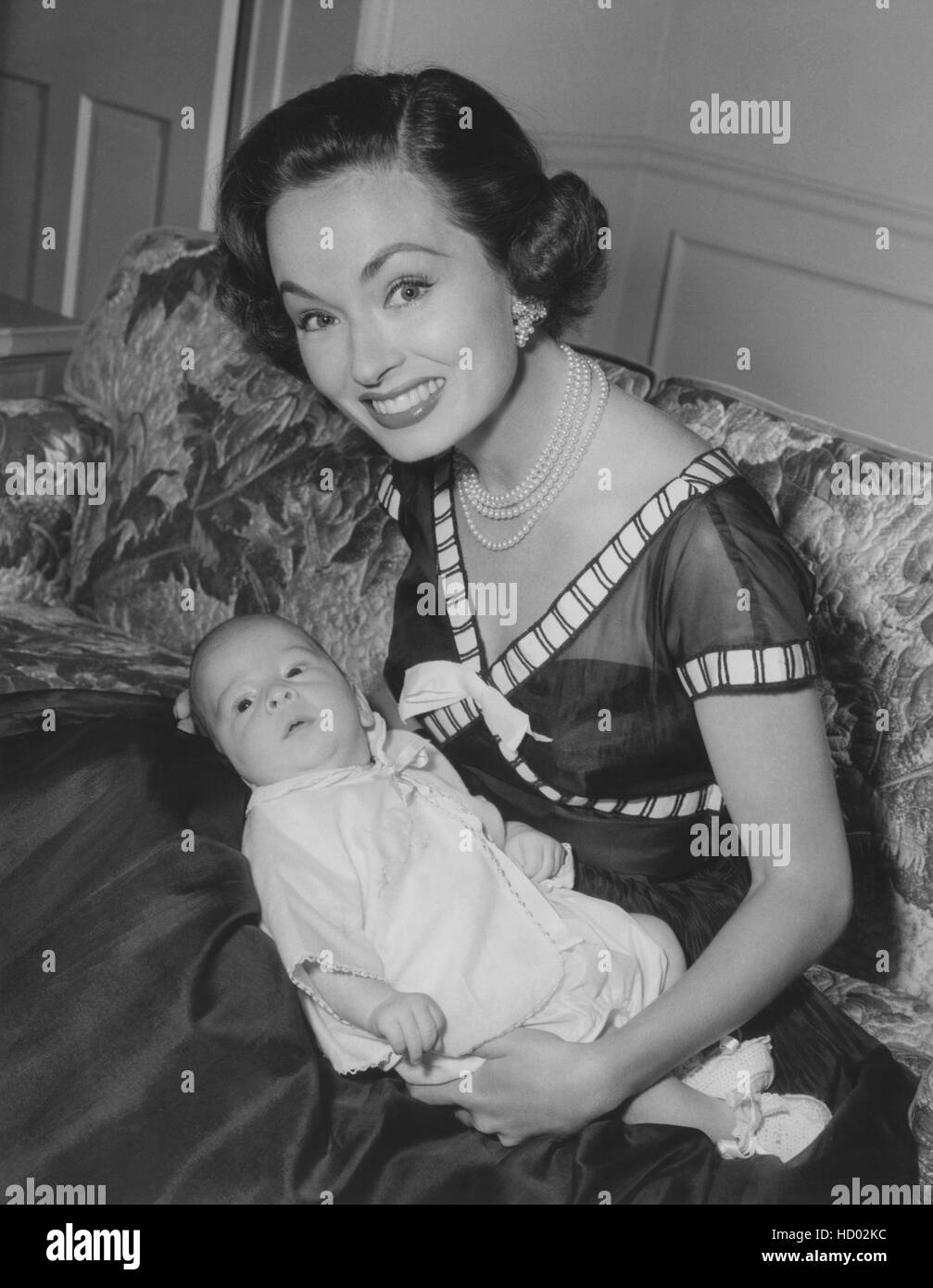 Ann Blyth holding newborn son Timothy Patrick McNulty, 1954 Stock Photo ...