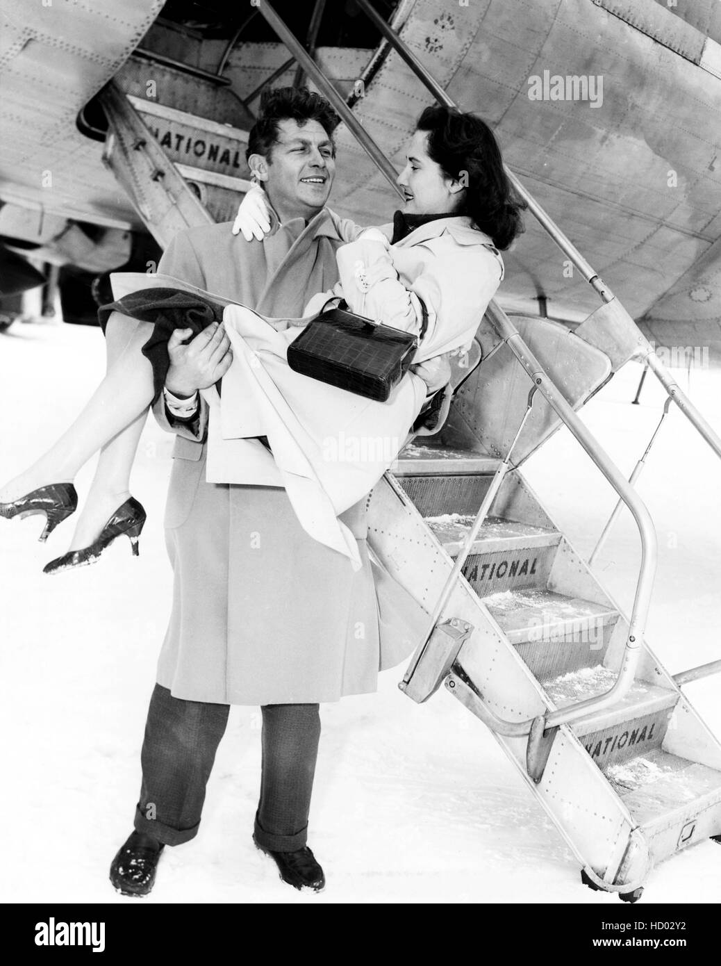 Andy Griffith, carriyng his first wife, Barbara Griffith, at Idlewild ...