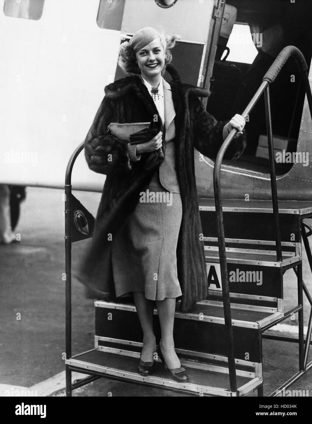 Anita Louise, arriving at Newark Airport, en route to Europe, April ...