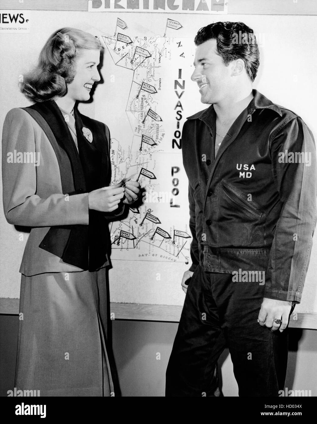 Anita Louise, left, plays 'Invasion Pool,' guessing where Allied troops ...