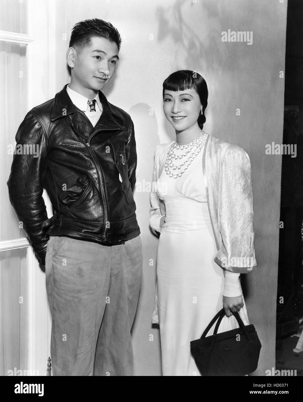 Anna May Wong, and her brother, Frank Wong, on set of DANGEROUS TO KNOW ...