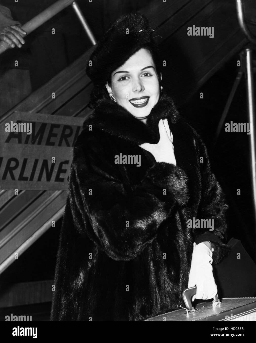Ann Miller, arriving in New York from Los Angeles, January 1957 Stock ...