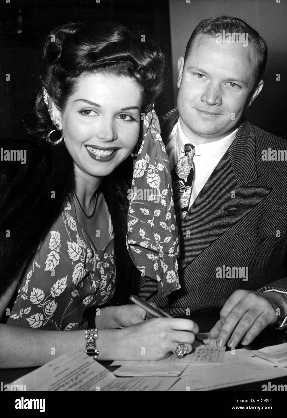 ANN MILLER, with Reese L. Milner applying for their marriage license in ...