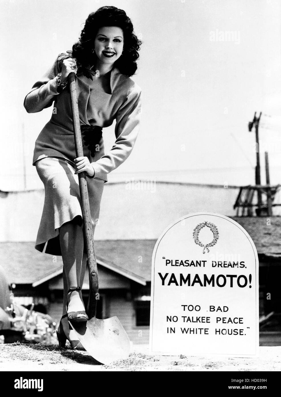 Ann Miller digging mock grave for Japanese high command during World ...