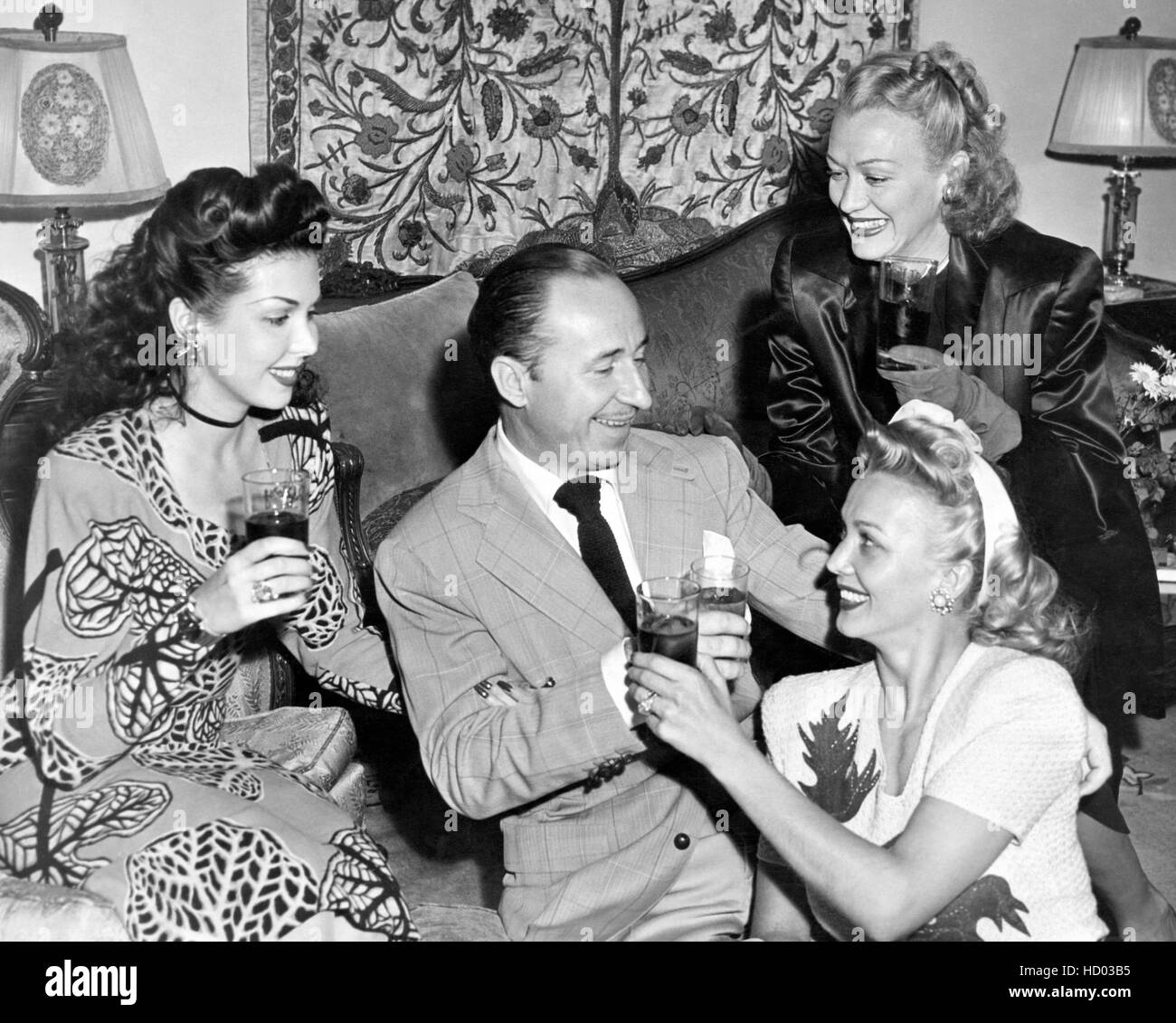 From left: Ann Miller, director Russell Birdwell, Carole Landis, Eve ...