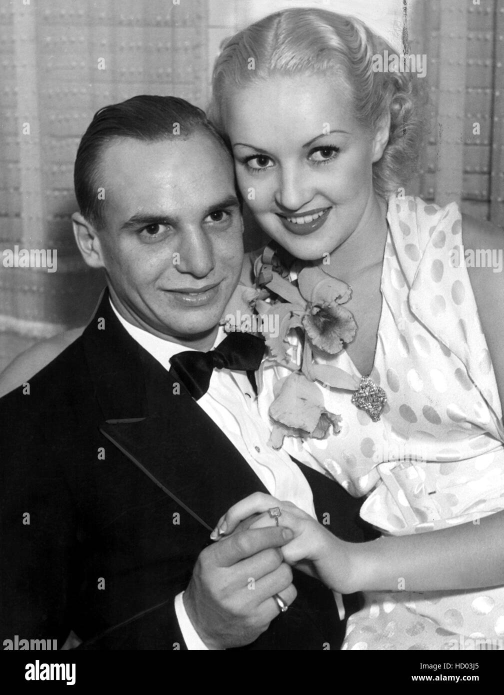 JACKIE COOGAN and BETTY GRABLE become engaged, 12/3/35 Stock Photo - Alamy