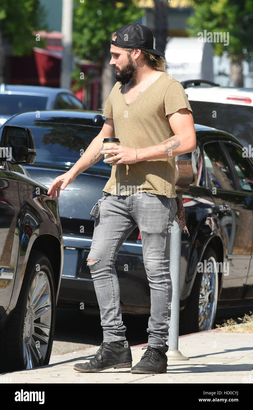 Marco perego takes his twin sons 2016 hi-res stock photography and ...