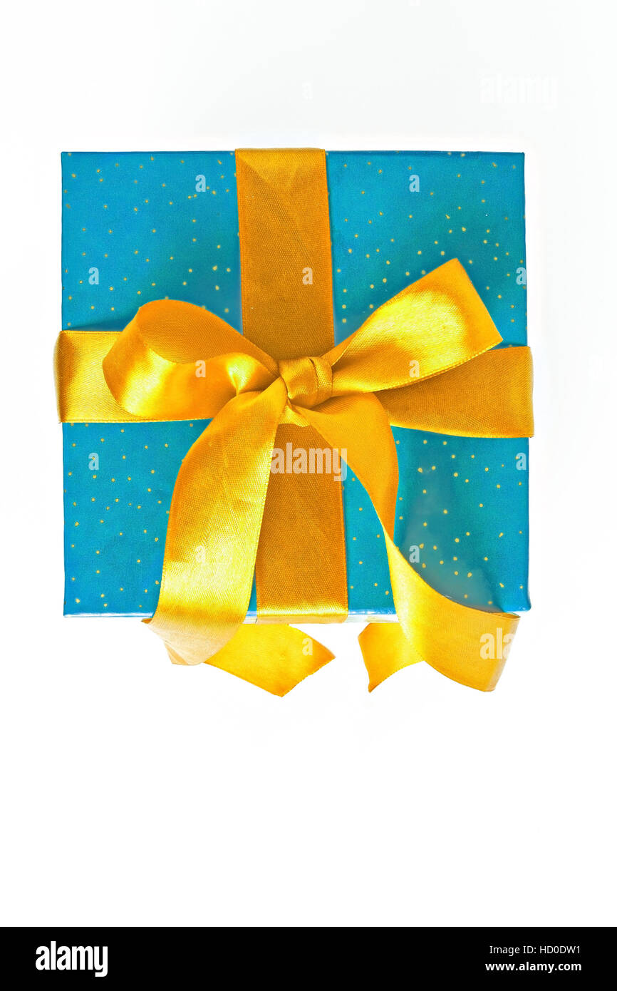 blue and yellow Christmas gift with ribbon isolated Stock Photo - Alamy