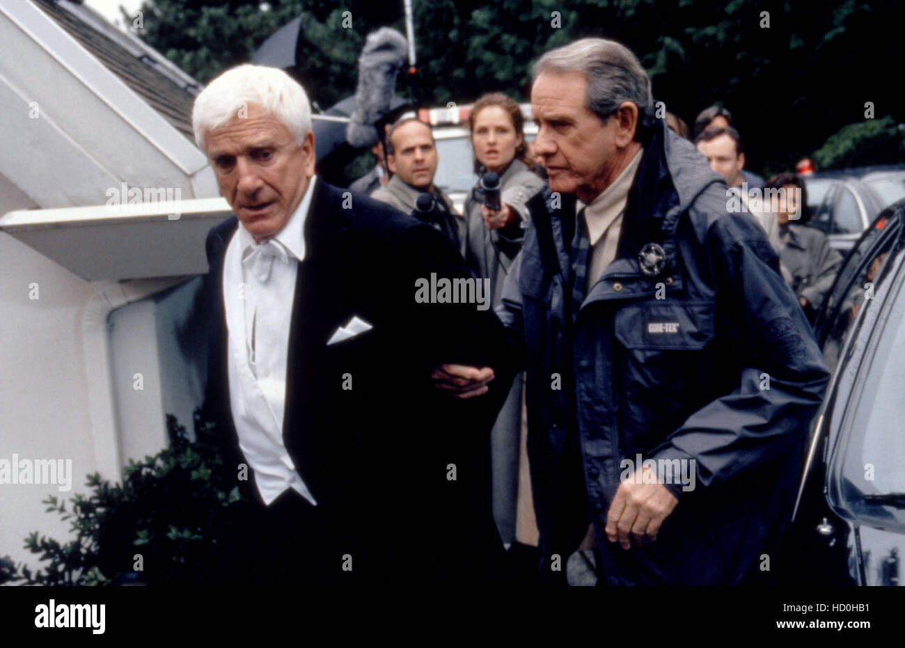 WRONGFULLY ACCUSED, Leslie Nielsen, Duncan Fraser, 1998 Stock Photo - Alamy