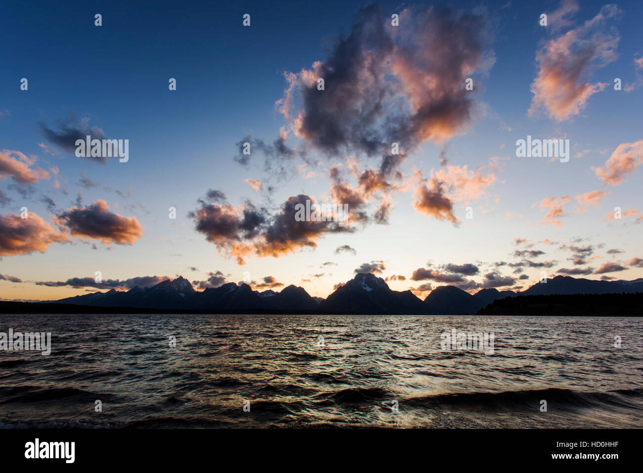 Sunset view of Teton Mountains and Jackson Lake, Grand Teton National ...