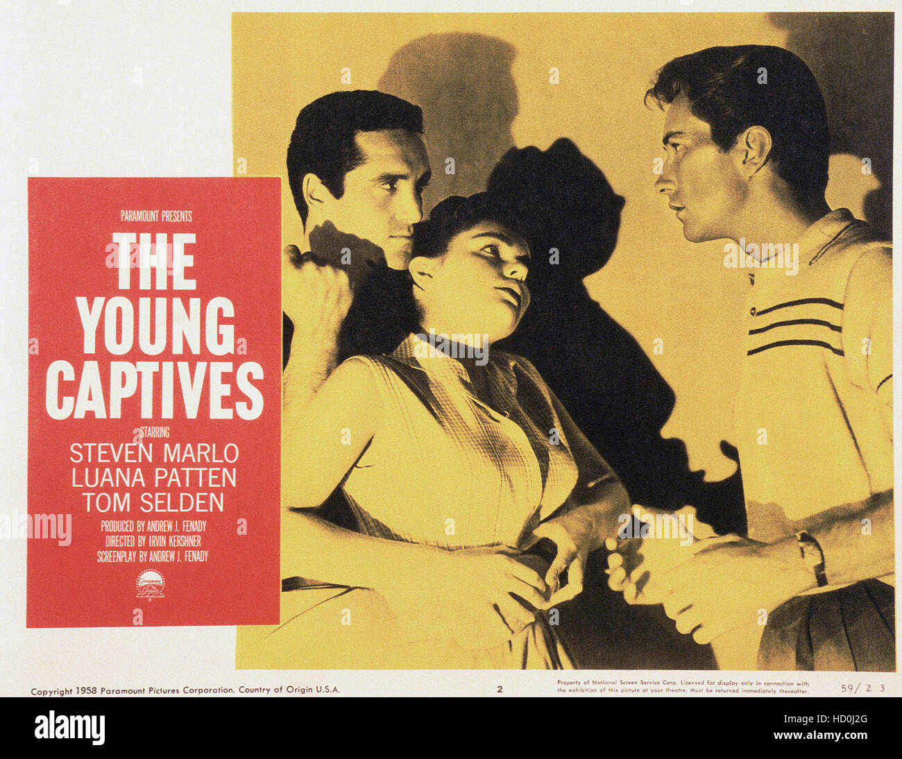 THE YOUNG CAPTIVES, US lobbycard, from left: Steven Marlo, Luana Patten ...