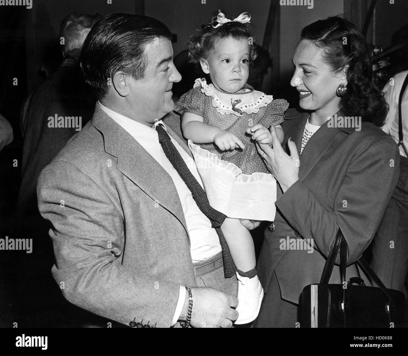 LOU COSTELLO enjoys a visit from his baby daughter CHRISTY COSTELLO and ...