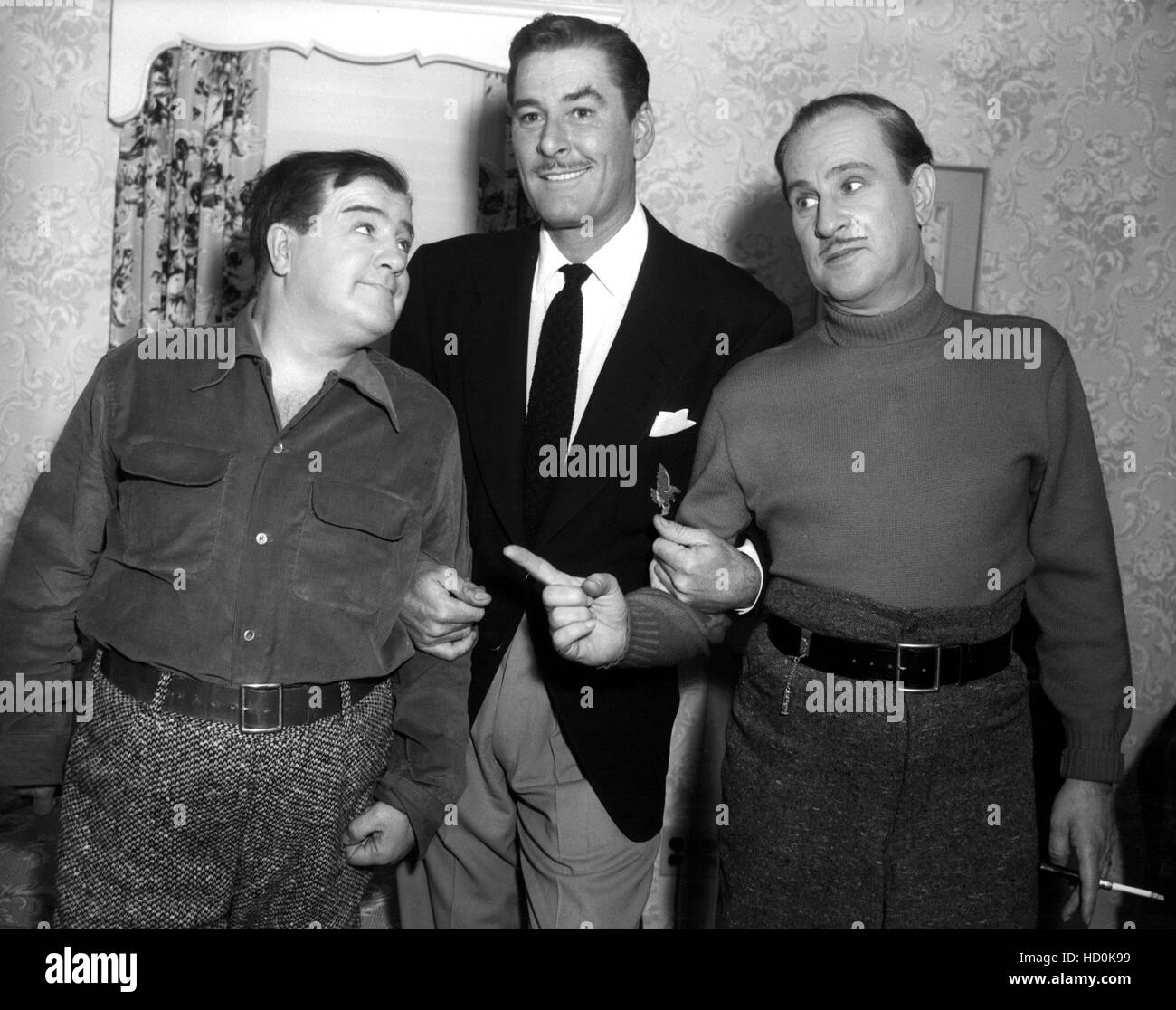 LOU COSTELLO, ERROL FLYNN and BUD ABBOTT (Abbott & Costello) pal around ...
