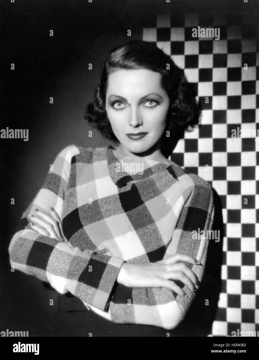 Adrienne Ames, modeling a plaid flannel blouse, 1933 Stock Photo - Alamy