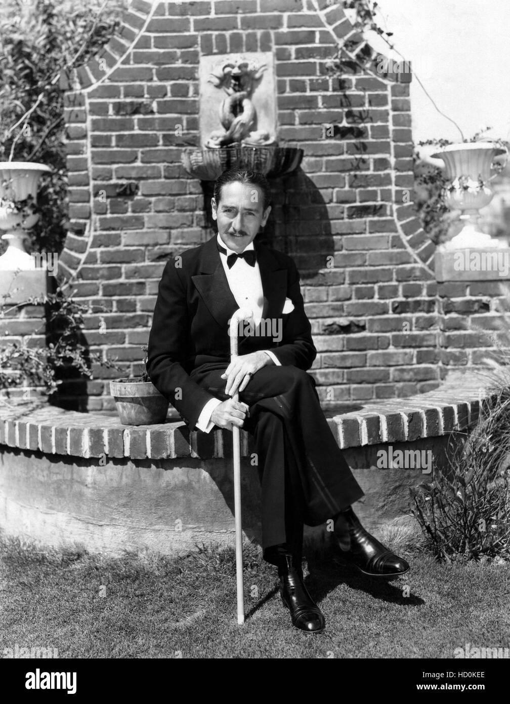 Adolphe Menjou at his home, ca. 1930 Stock Photo - Alamy