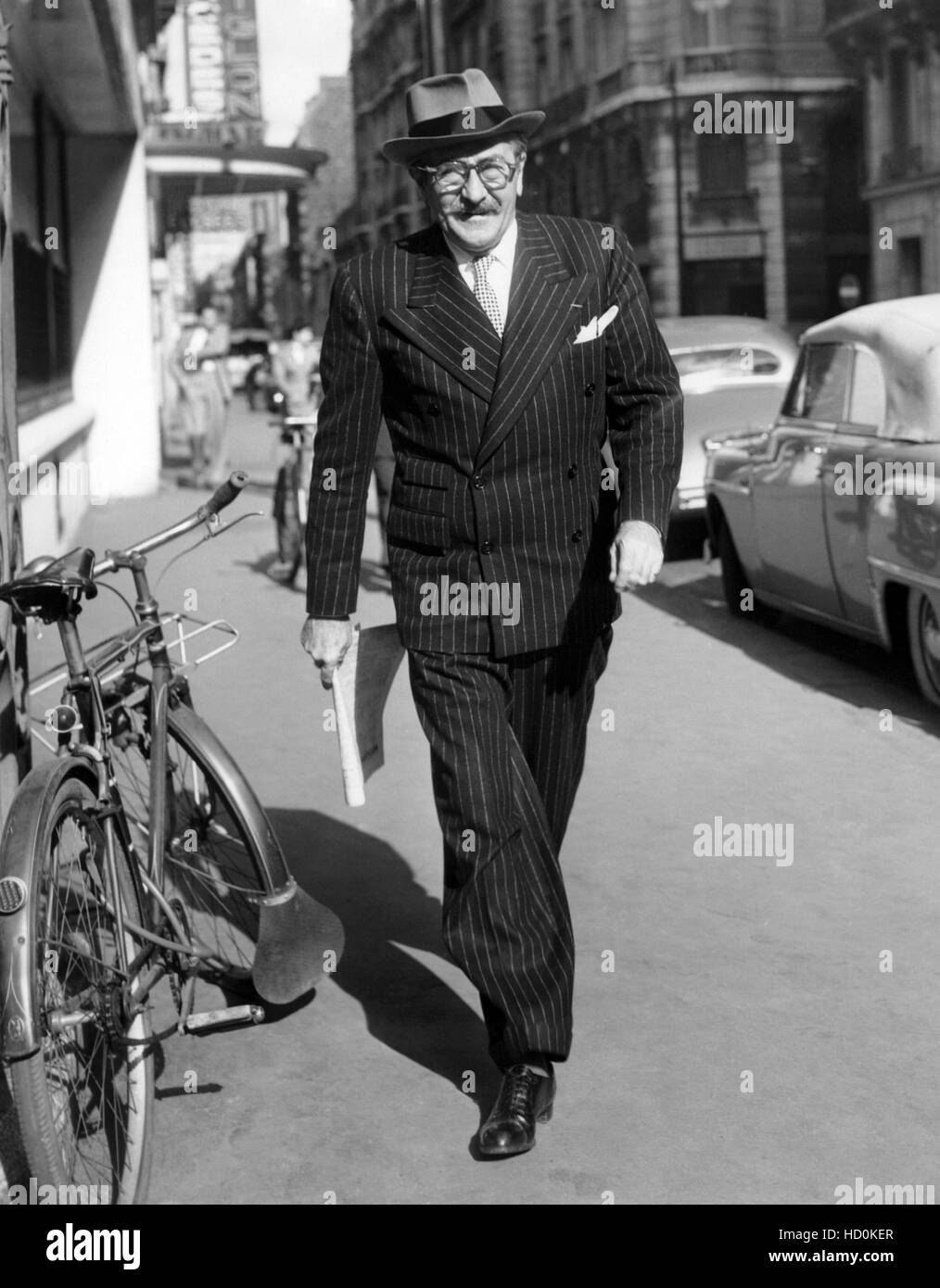 Adolphe Menjou on his way to the Claridge Hotel, Paris, France, ca ...