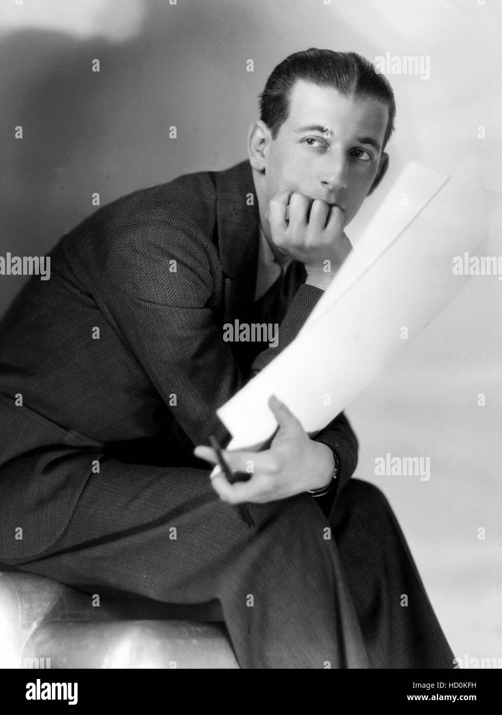 Adrian (aka Gilbert Adrian), photo by Hurrell, ca. 1931 Stock Photo - Alamy