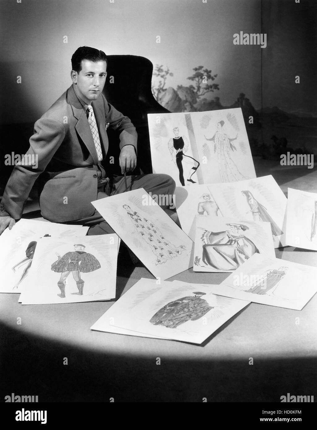 Adrian, (aka Gilbert Adrian), with his sketches for ROMEO AND JULIET ...