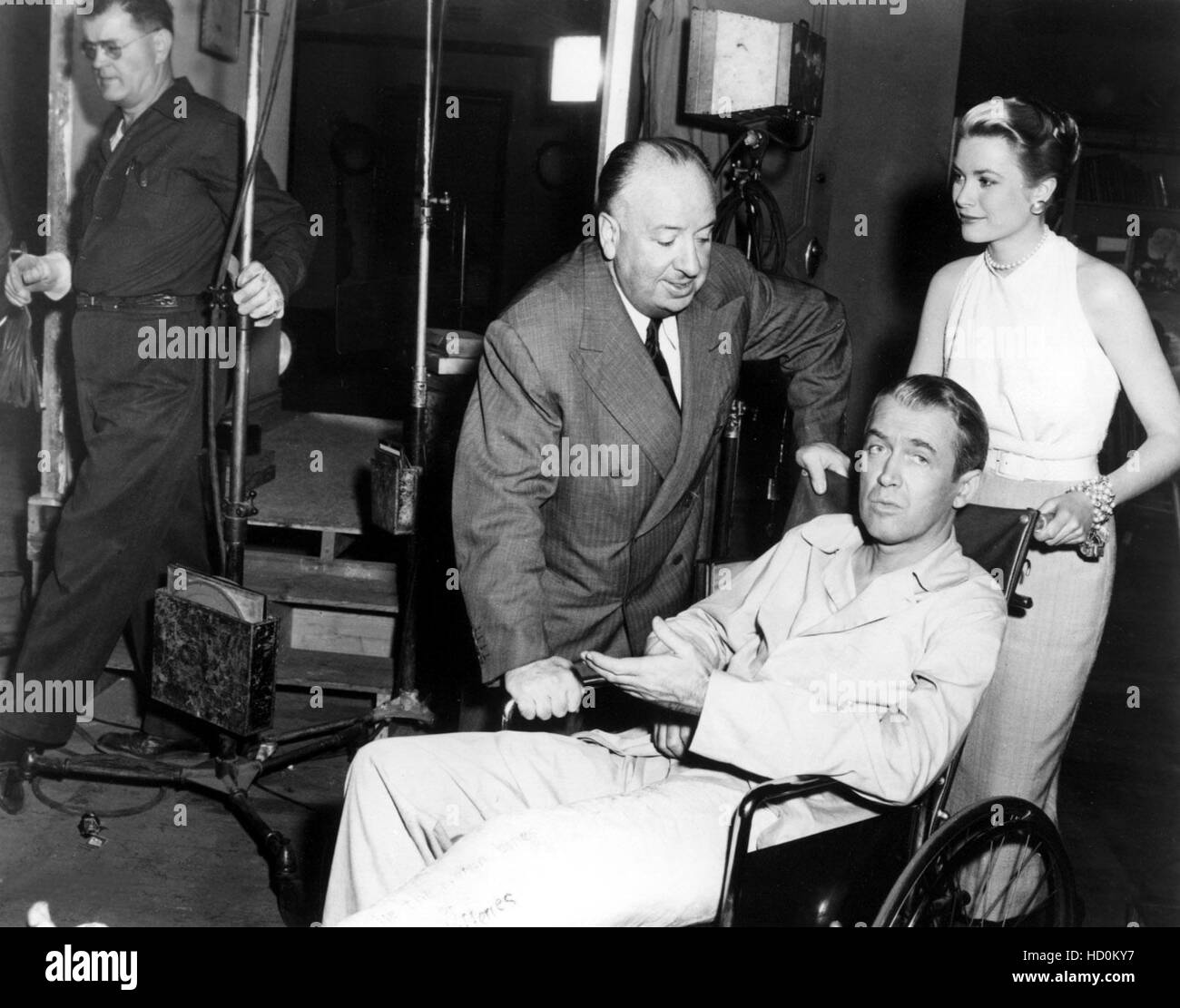 REAR WINDOW, director Alfred Hitchcock, JAMES STEWART and GRACE KELLY ...