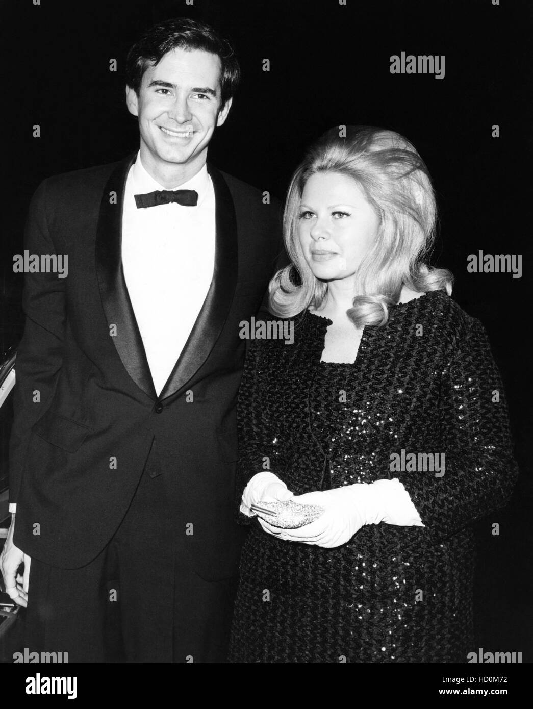 From left: Anthony Perkins, agent Sue Mengers, ca. 1960s Stock Photo ...
