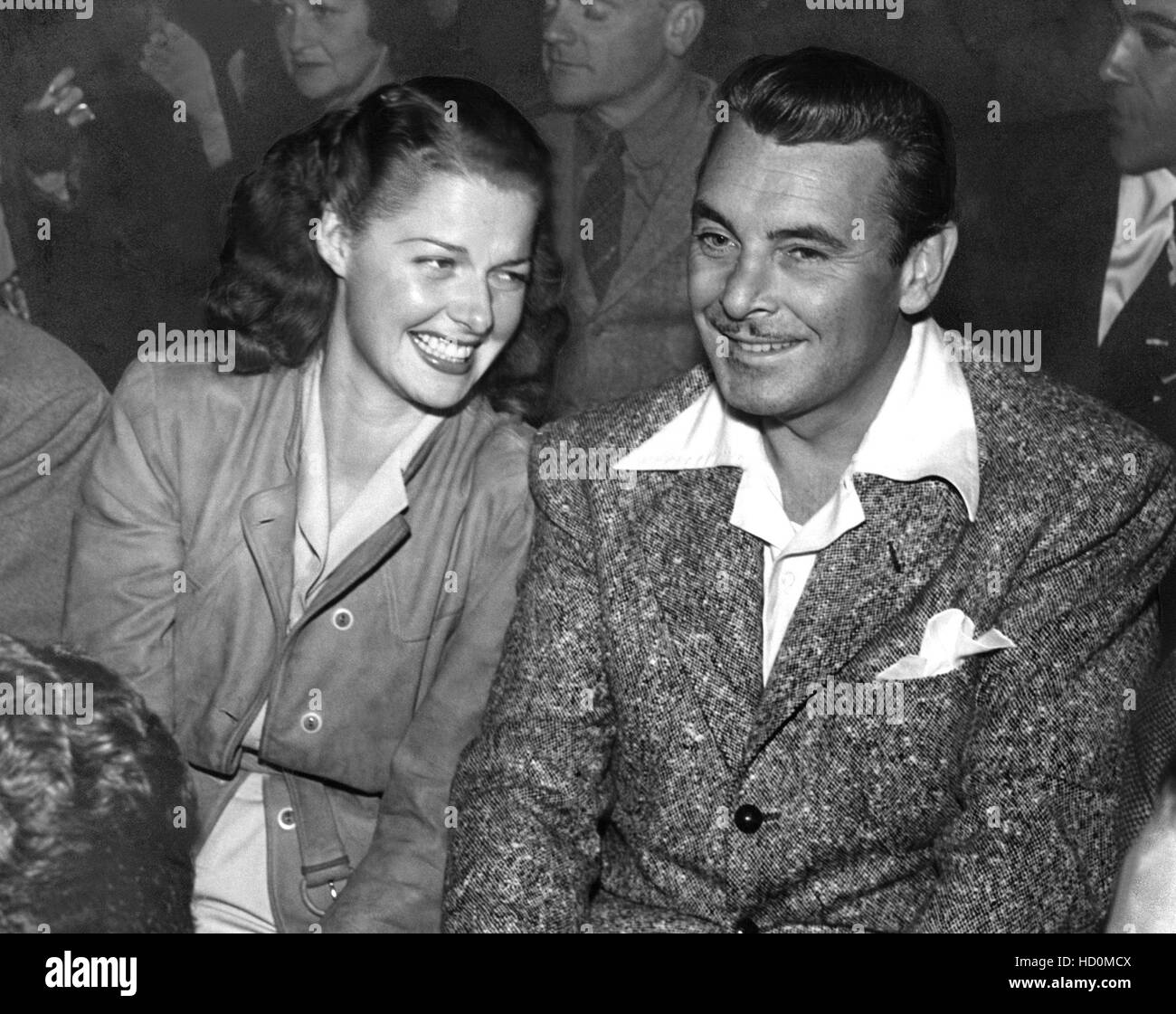 ANN SHERIDAN, with George Brent at Warner Bros. employee meeting, circa ...