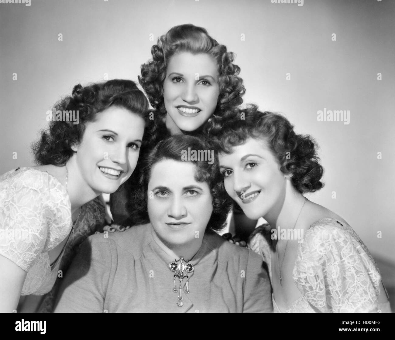 The Andrews Sisters (from left, Maxene, Patty, Laverne), with their ...
