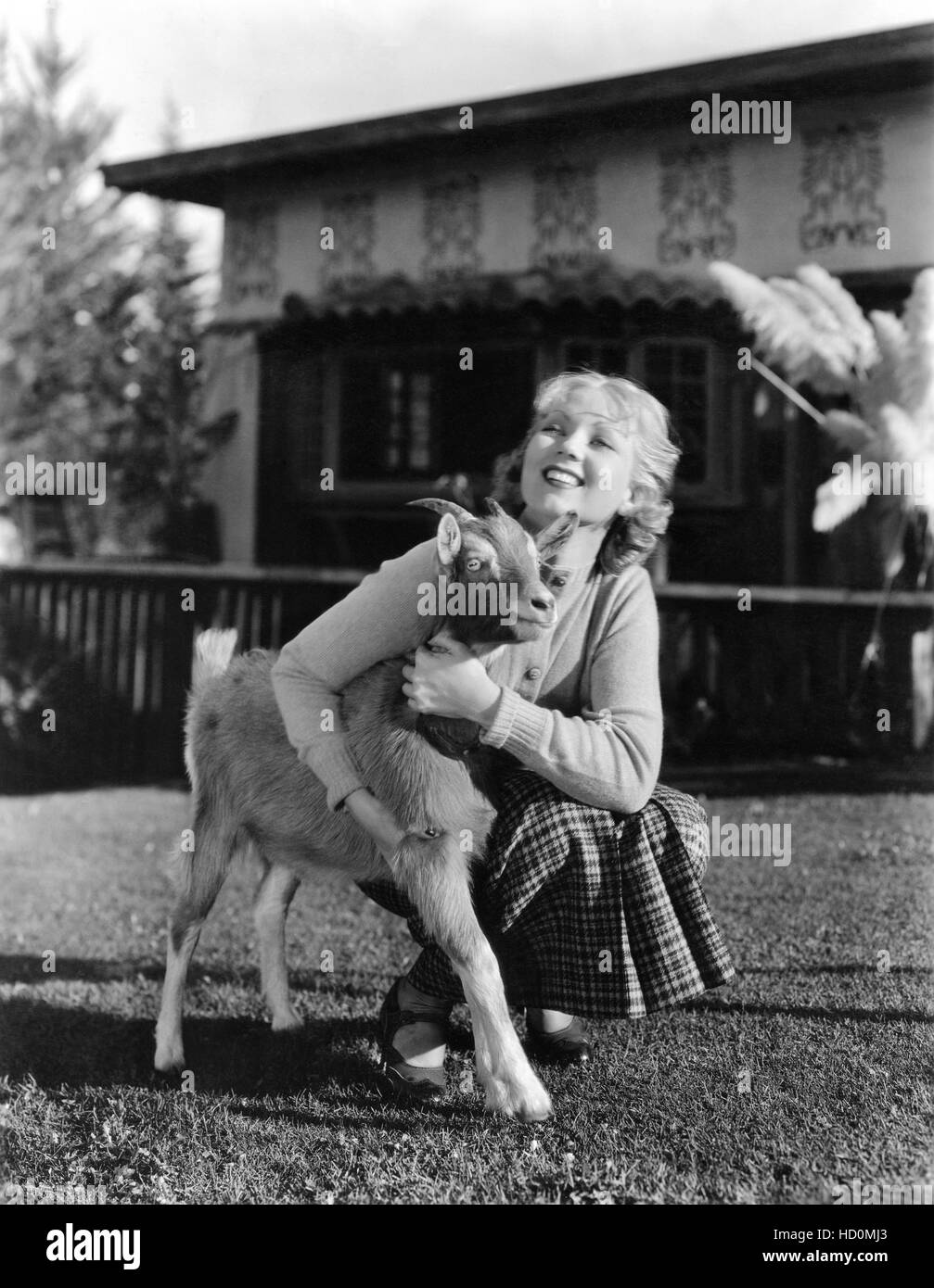 Ann Sothern posing with her goat, 'Marge,' named after the character ...