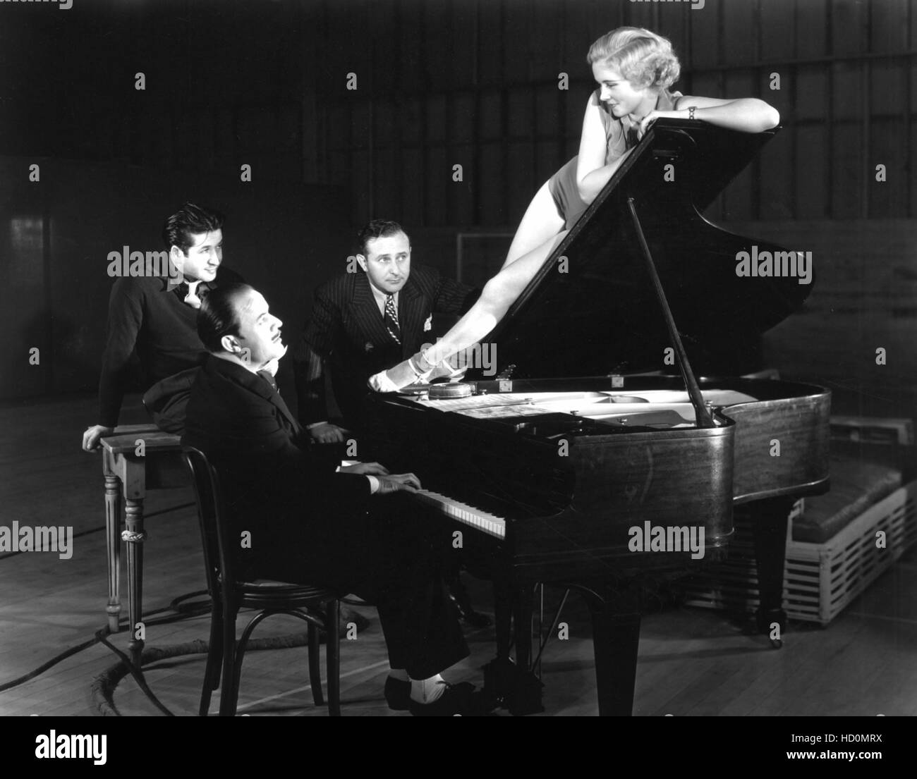 MGM executive Dave Gould and composers Nacio Herb Brown and Arthur ...