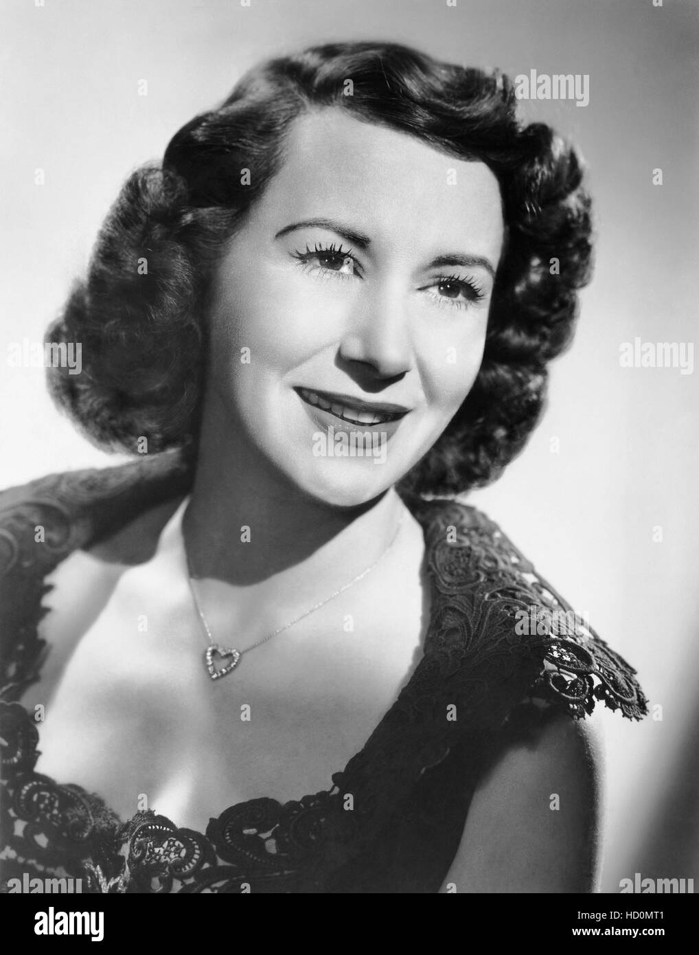 Arlene Francis, wearing her signature diamond-heart pendant, 1952 Stock ...