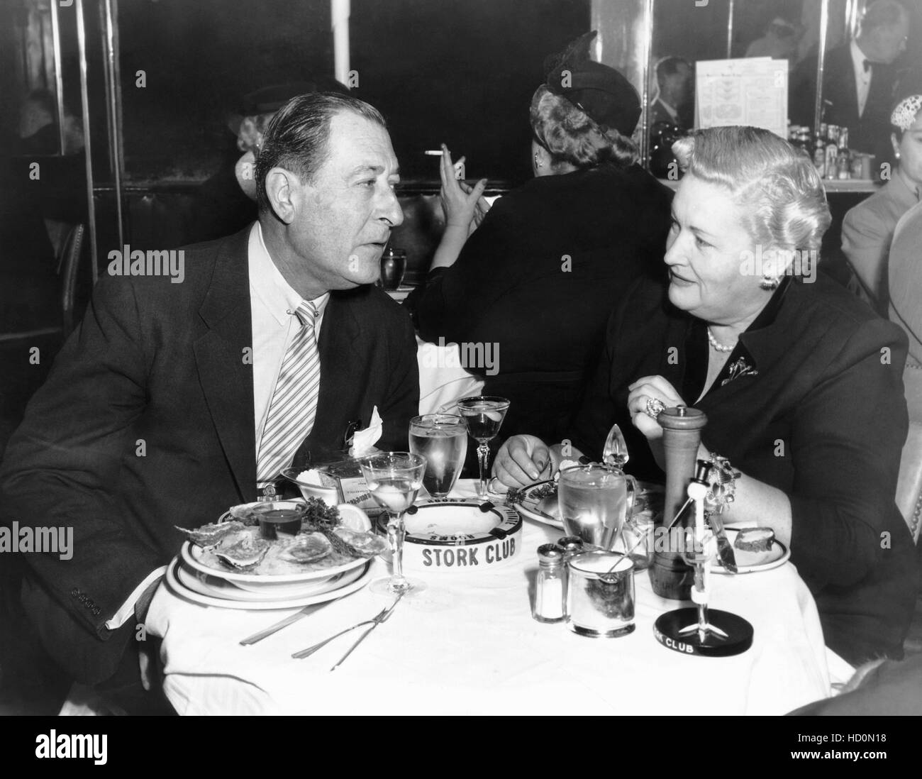 Arthur Treacher and his wife, Virginia, at the Stork Club, 1953 Stock ...