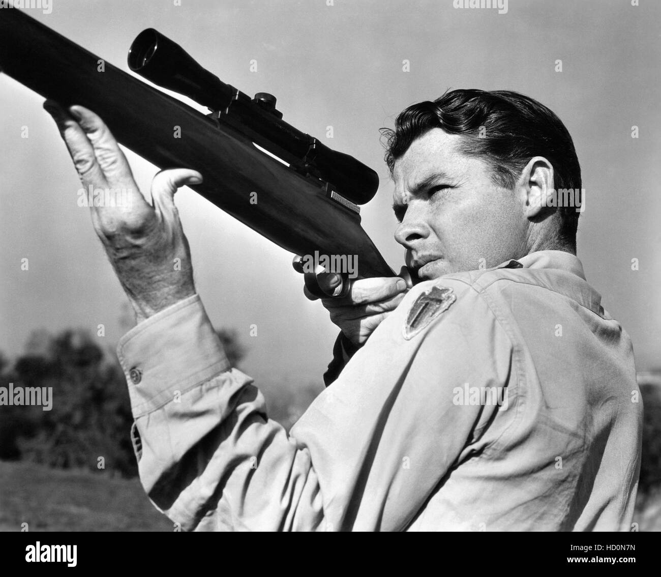 Audie Murphy, skeet-shooting on the Unversal back lot, 1952 Stock Photo ...
