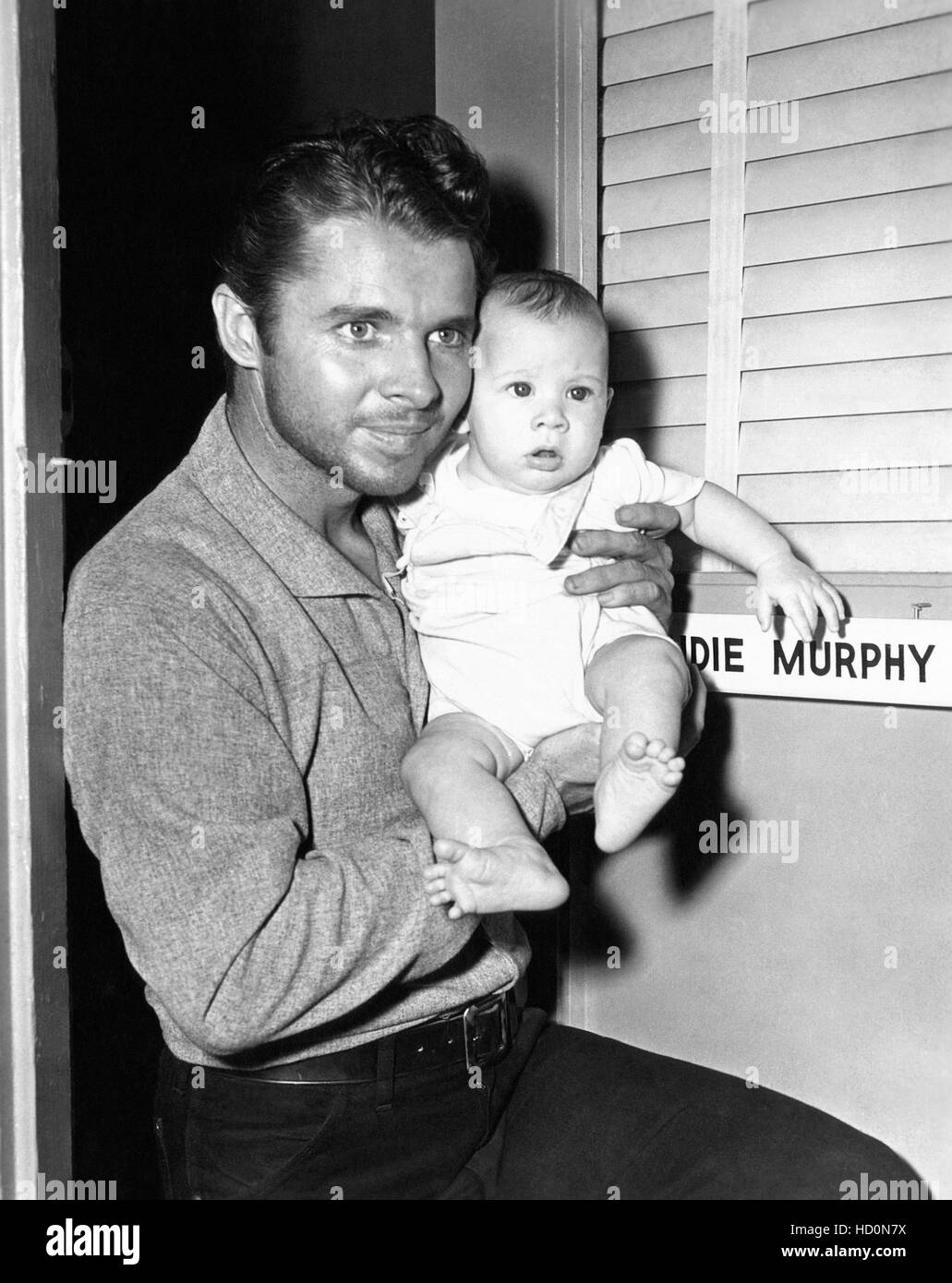 Audie Murphy, visited by his three-month-old son, Terry Murphy, 1952 ...
