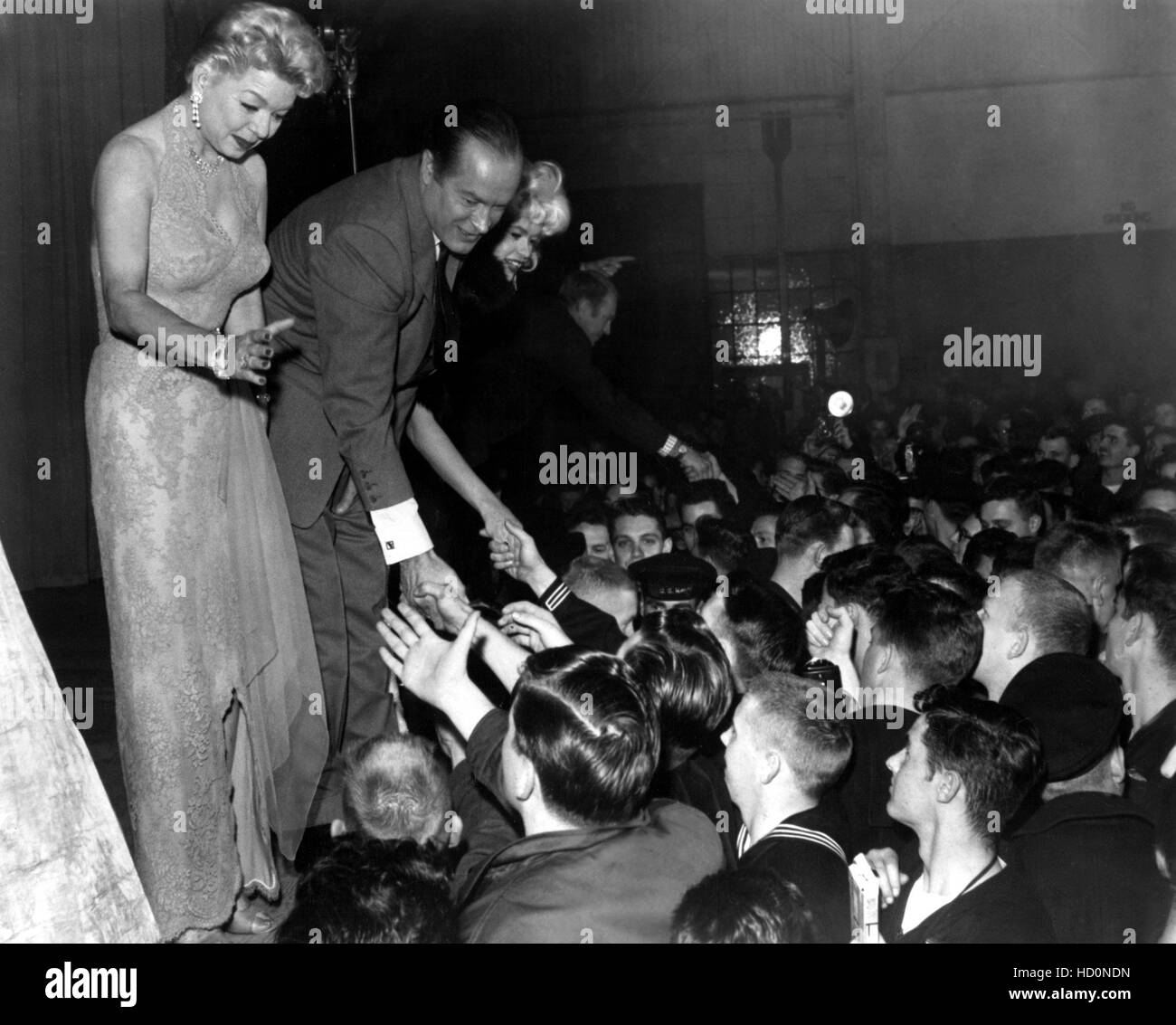 Frances Langford, Bob Hope shaking hands with the troops during a USO ...