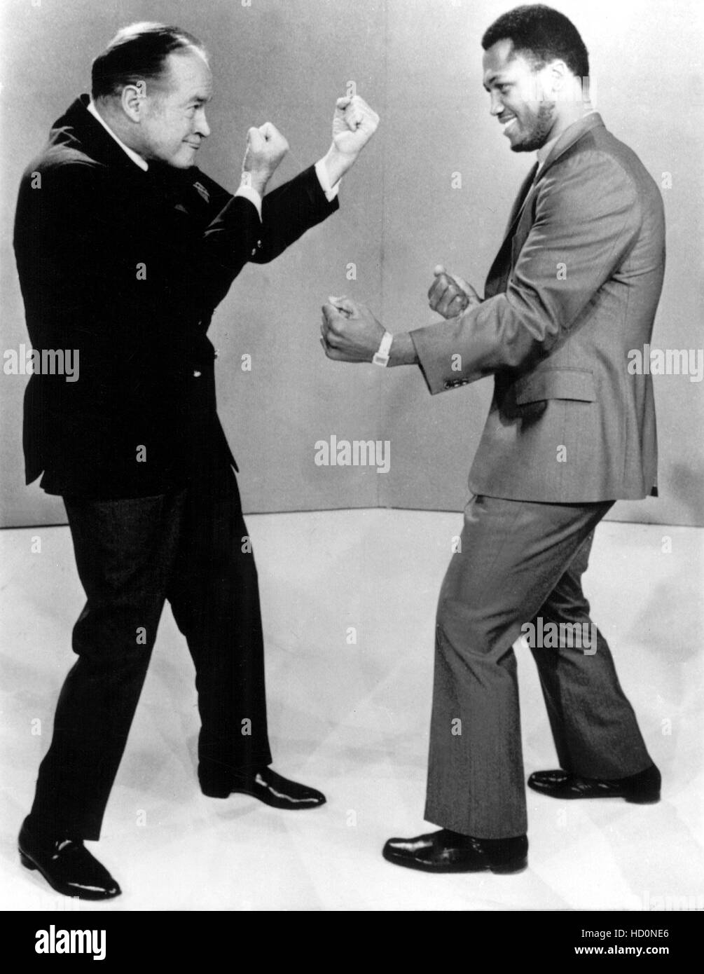 Bob Hope, Joe Frazier strike boxing poses while rehearsing a television ...
