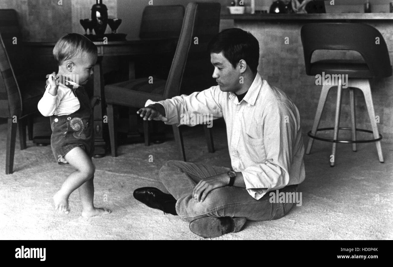 BRANDON LEE learns some martial arts moves from his father, BRUCE LEE ...